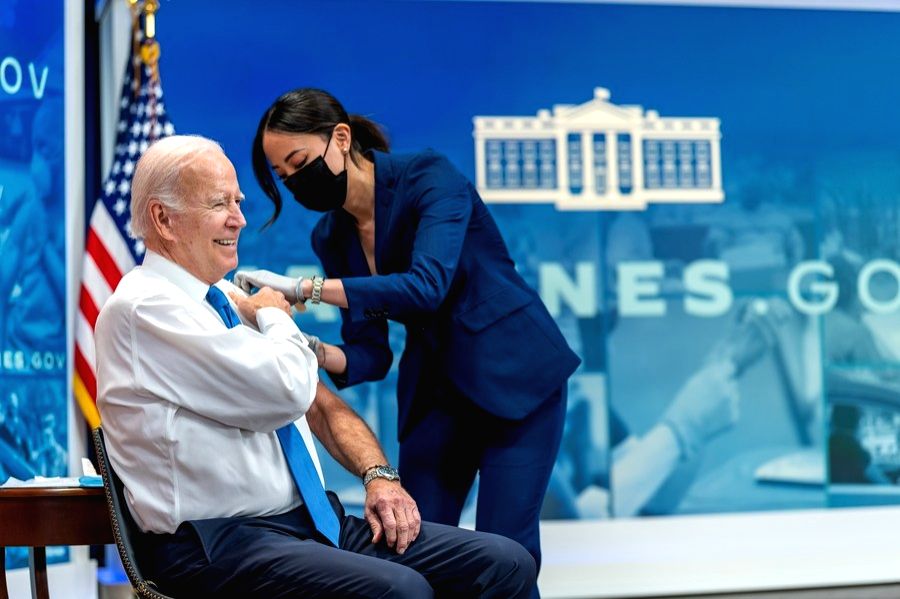 U.S. President Joe Biden receives an updated COVID-19 booster shot in ...