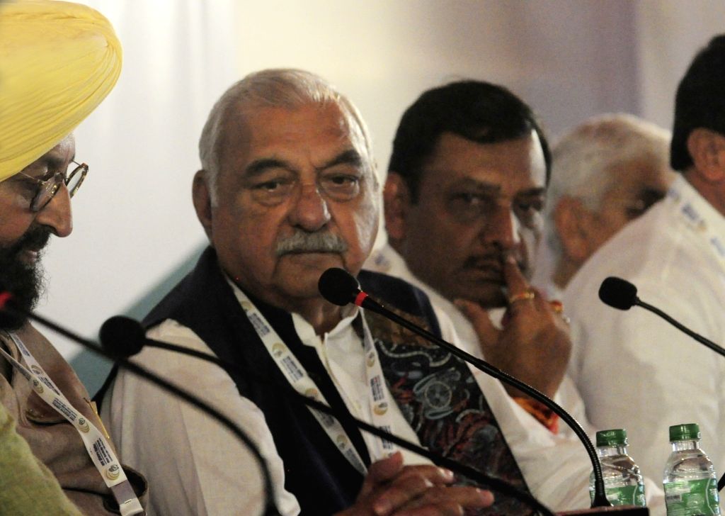 Congress Party leader Bhupinder Singh Hooda addressing a press conference
