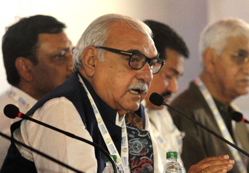 Congress Party leader Bhupinder Singh Hooda addressing a press conference