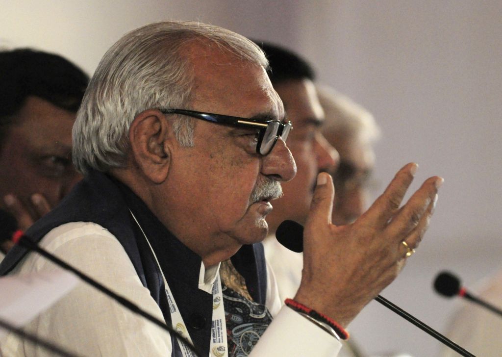 Congress Party leader Bhupinder Singh Hooda addressing a press conference