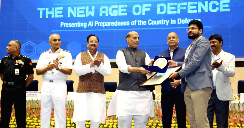 Union Defence Minister Rajnath Singh felicitating students