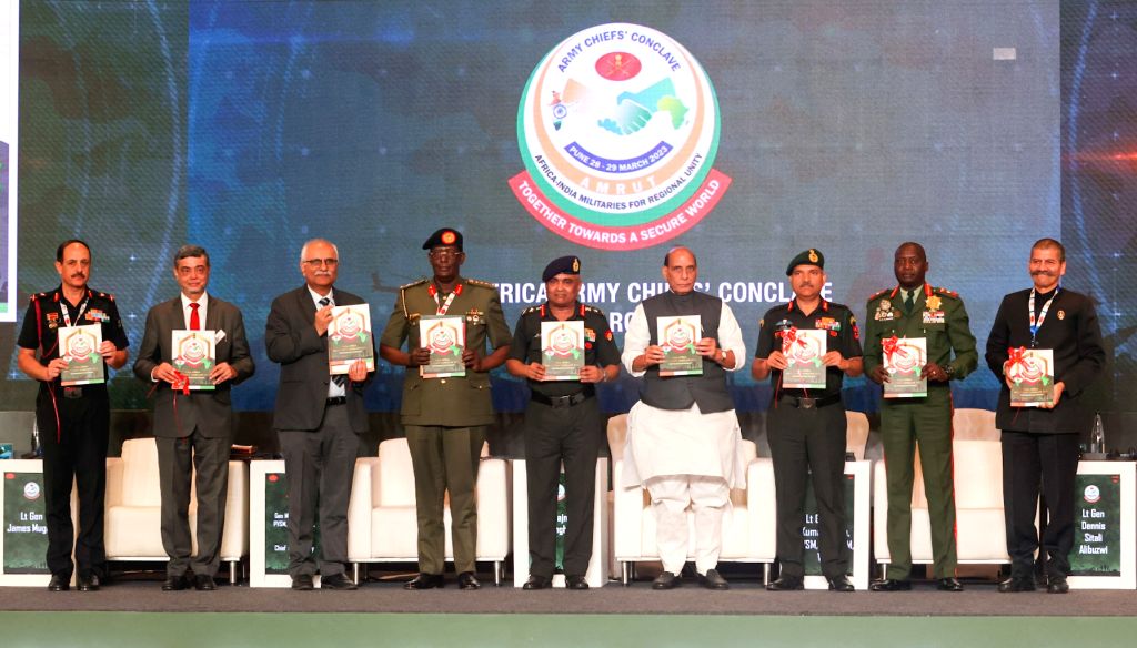 Union Defence Minister Rajnath Singh poses for a group photo with ...