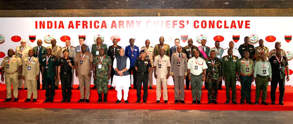Union Defence Minister Rajnath Singh poses for a group photo with ...