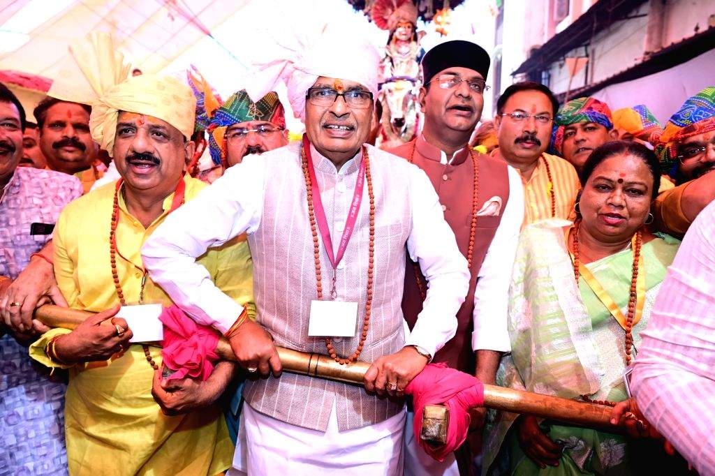 Union Minister Shivraj Singh Chouhan pulls the chariot of Baba Mahakal