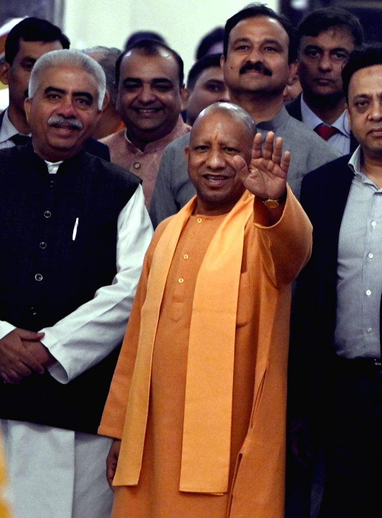 Uttar Pradesh Chief Minister Yogi Adityanath arrives to attend the ...
