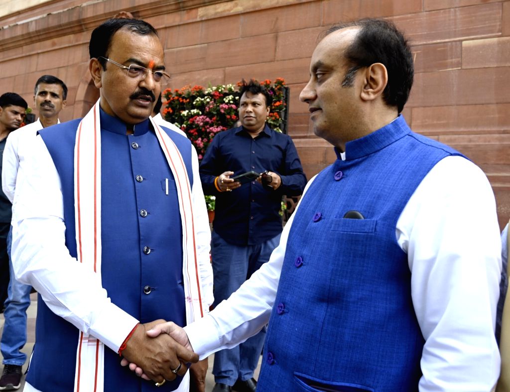 UP Deputy CM KP Maurya and BJP MP Sudhanshu Trivedi at Parliament