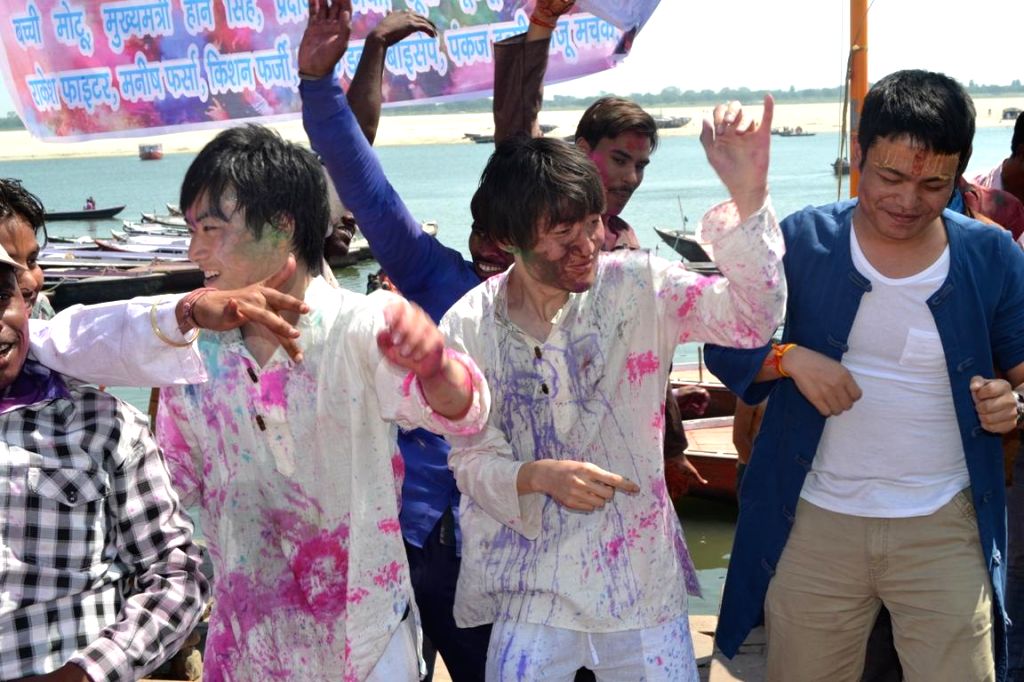 Foreigners celebrate Holi