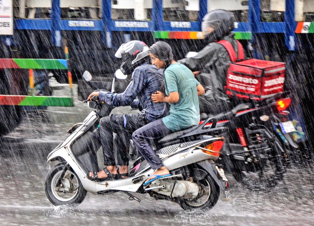Vehicle ply on road as heavy rain lashes in Bengaluru