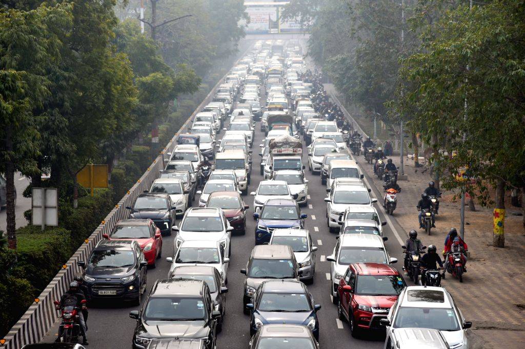 Vehicles stuck in a traffic jam in view of farmers' 'Delhi Chalo' march