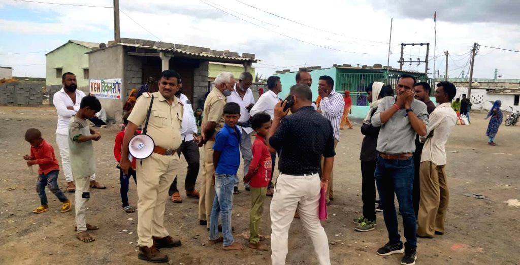 Villagers wait for transport for evacuation at Jakhau village ahead of ...