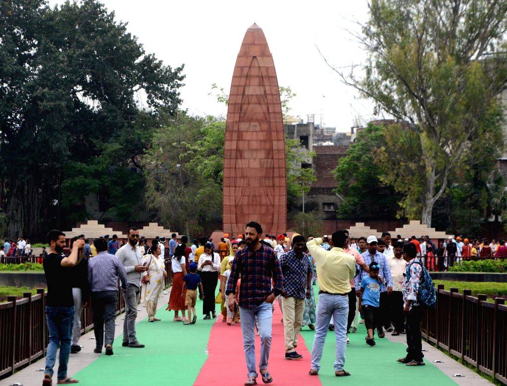 Visitors at the Jallianwala Bagh Martyrs' memorial on the Jallianwala ...