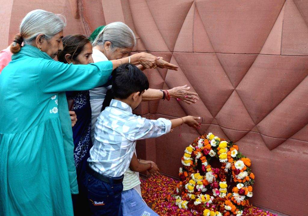 Visitors at the Jallianwala Bagh Martyrs' memorial on the Jallianwala ...