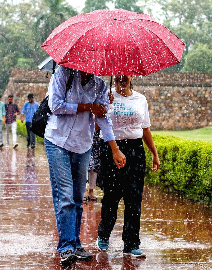 Visitors enjoy rain at Humayun’s Tomb