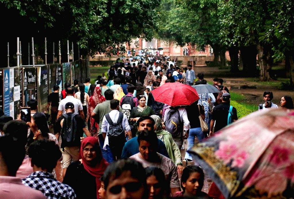 Visitors enjoy rain at Humayun’s Tomb