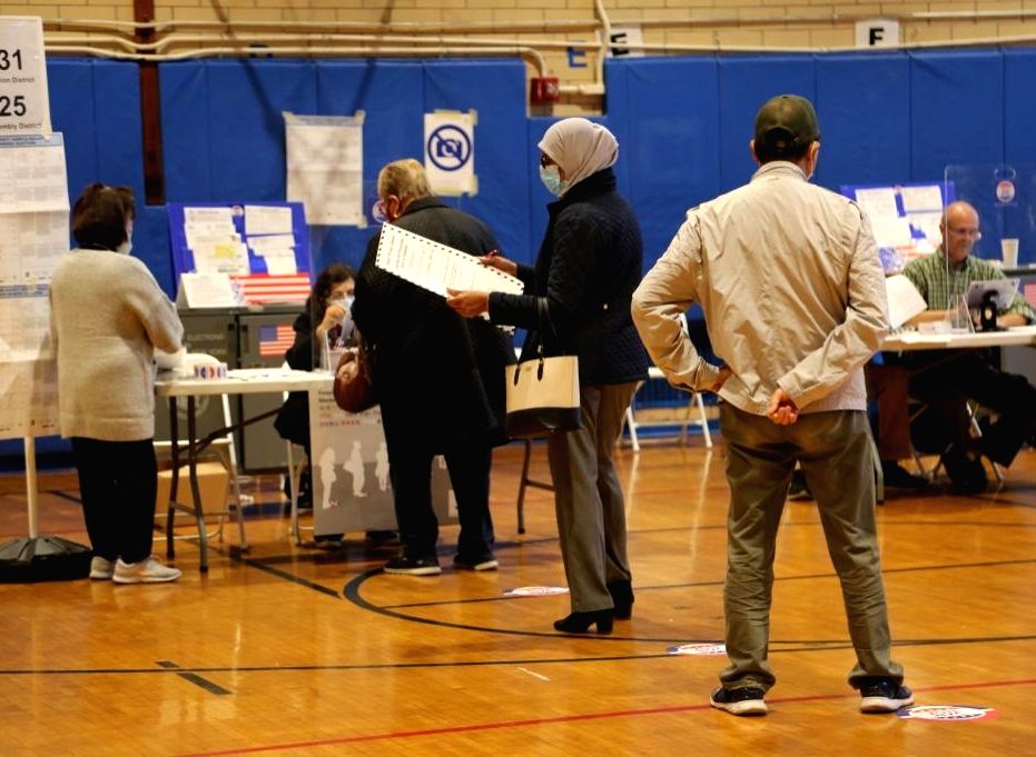New York :Voters line up to register at a polling station in New York