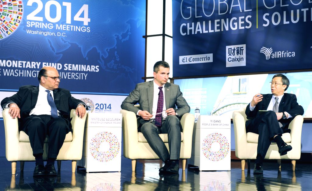 Yi Gang deputy governor of China's central bank, speaks at a seminar