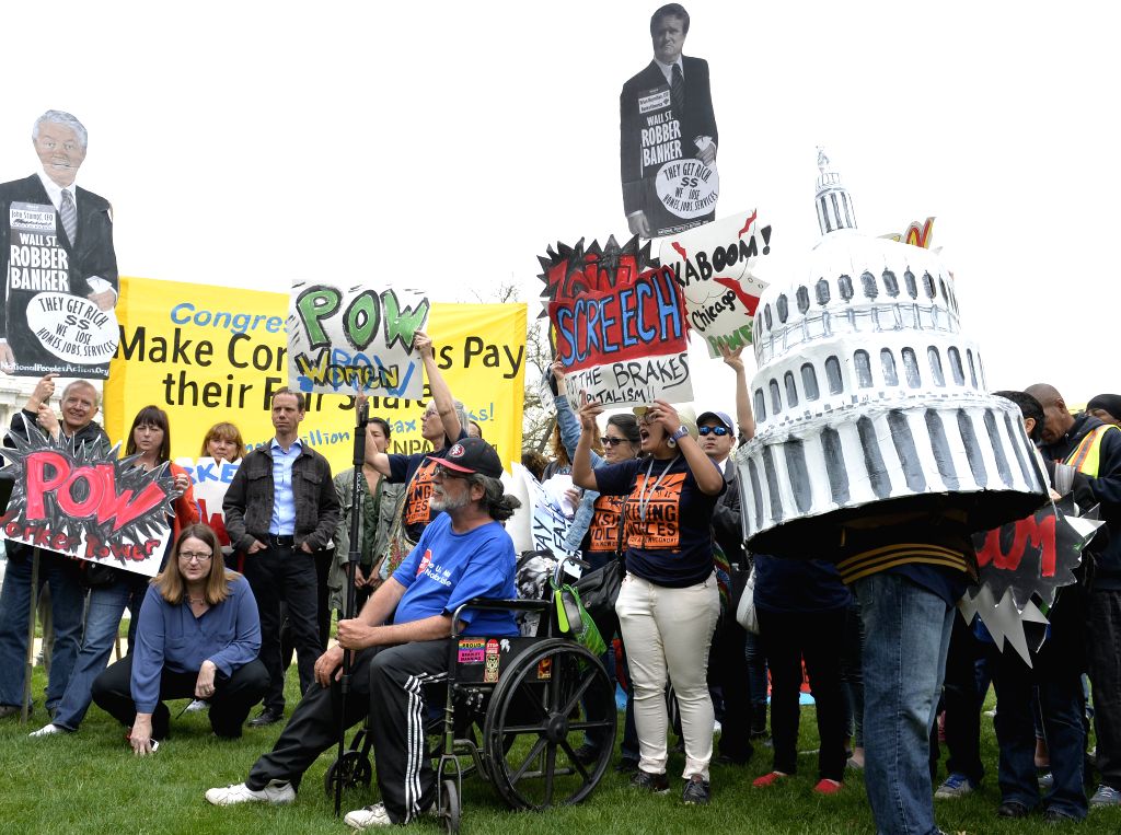 A group of concerned workers protest against income inequality and the ...