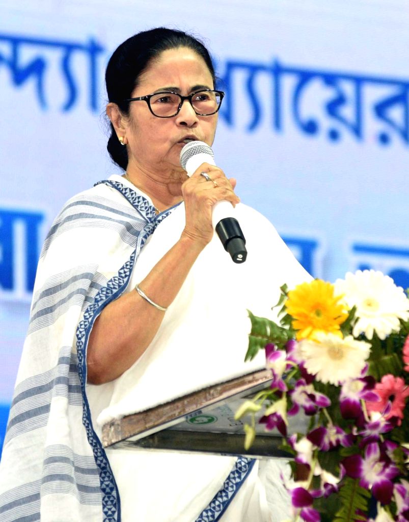 West Bengal Chief Minister Mamata Banerjee addresses during a programme ...