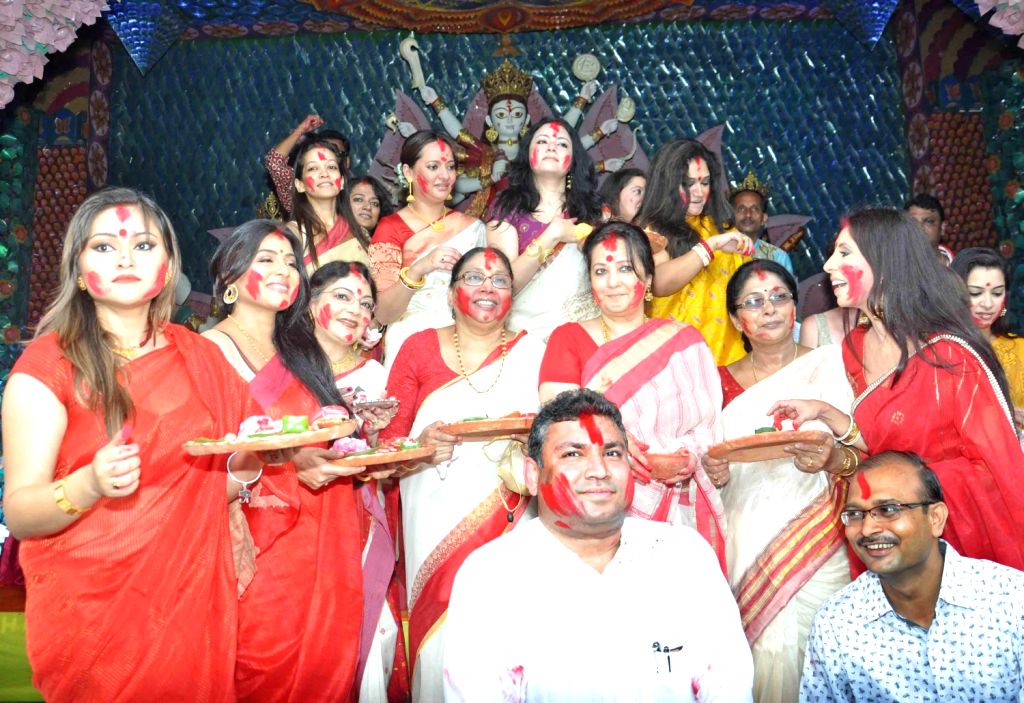 Celebrities during 'Sindoor Khela' at Chalta Bagan Durga Puja pandal