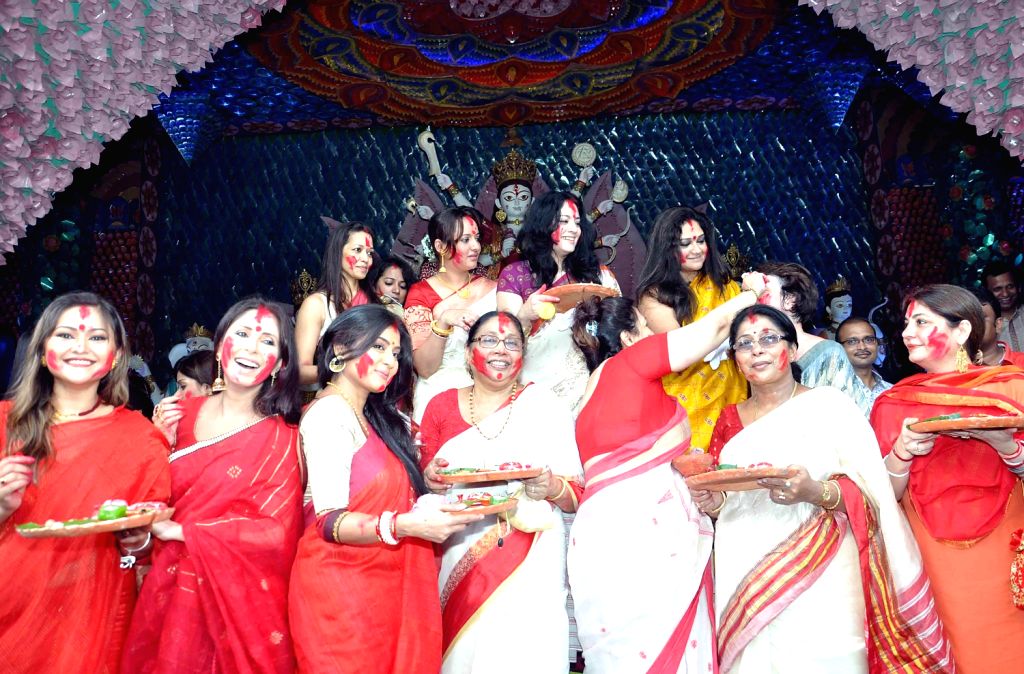 Celebrities during 'Sindoor Khela' at Chalta Bagan Durga Puja pandal