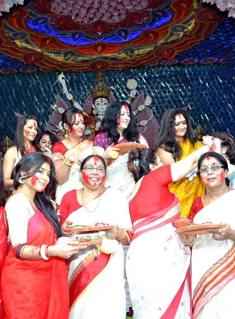 Celebrities during 'Sindoor Khela' at Chalta Bagan Durga Puja pandal