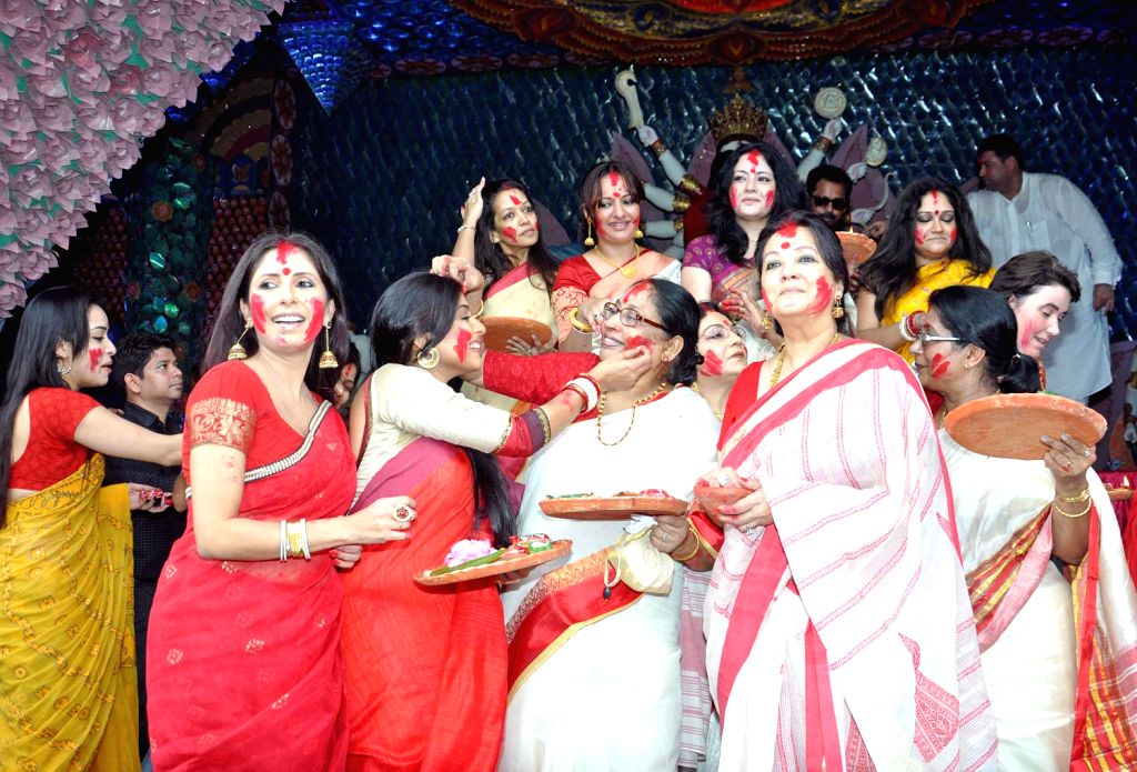 Celebrities during 'Sindoor Khela' at Chalta Bagan Durga Puja pandal