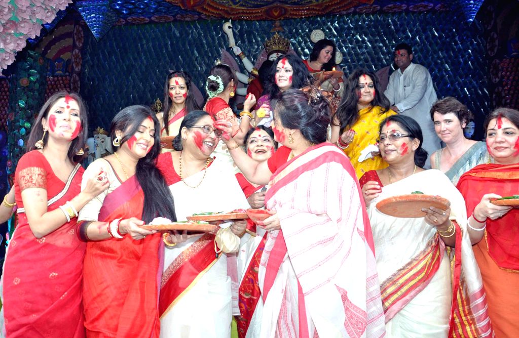 Celebrities during 'Sindoor Khela' at Chalta Bagan Durga Puja pandal