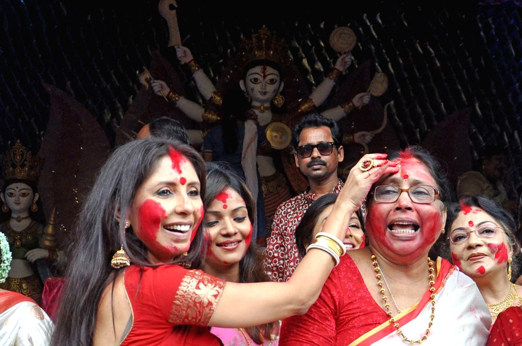 Celebrities during 'Sindoor Khela' at Chalta Bagan Durga Puja pandal