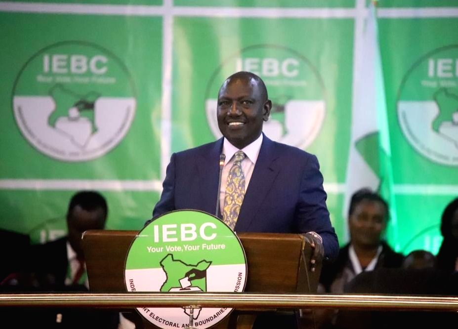 William Ruto (Front) speaks after receiving a certificate to confirm ...