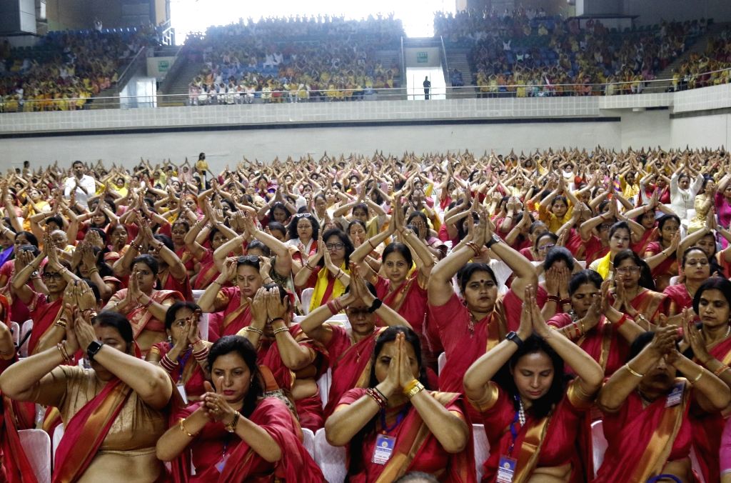 New Delhi : Women perform Yoga along with Yoga guru Baba Ramdev during ...