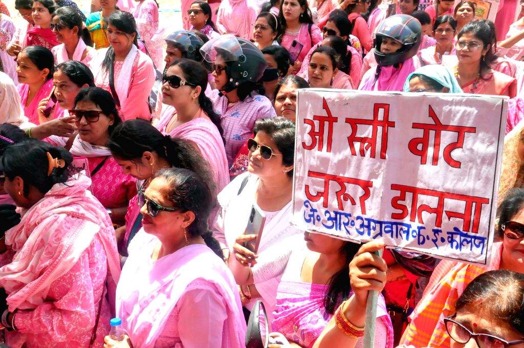 Women take part in a Pink Rally for Voter Awareness ahead of the Lok ...