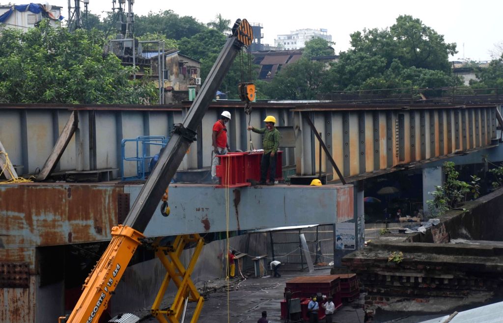 Kolkata : Workers were busy demolishing the incomplete Vivekananda ...
