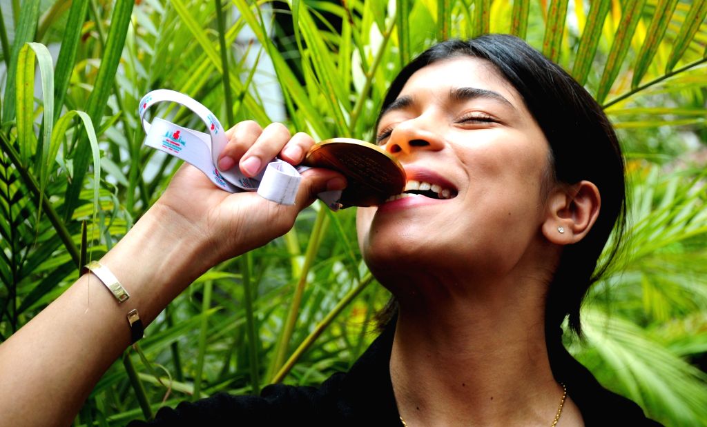 World champion Indian boxer Nikhat Zareen shows her gold medal