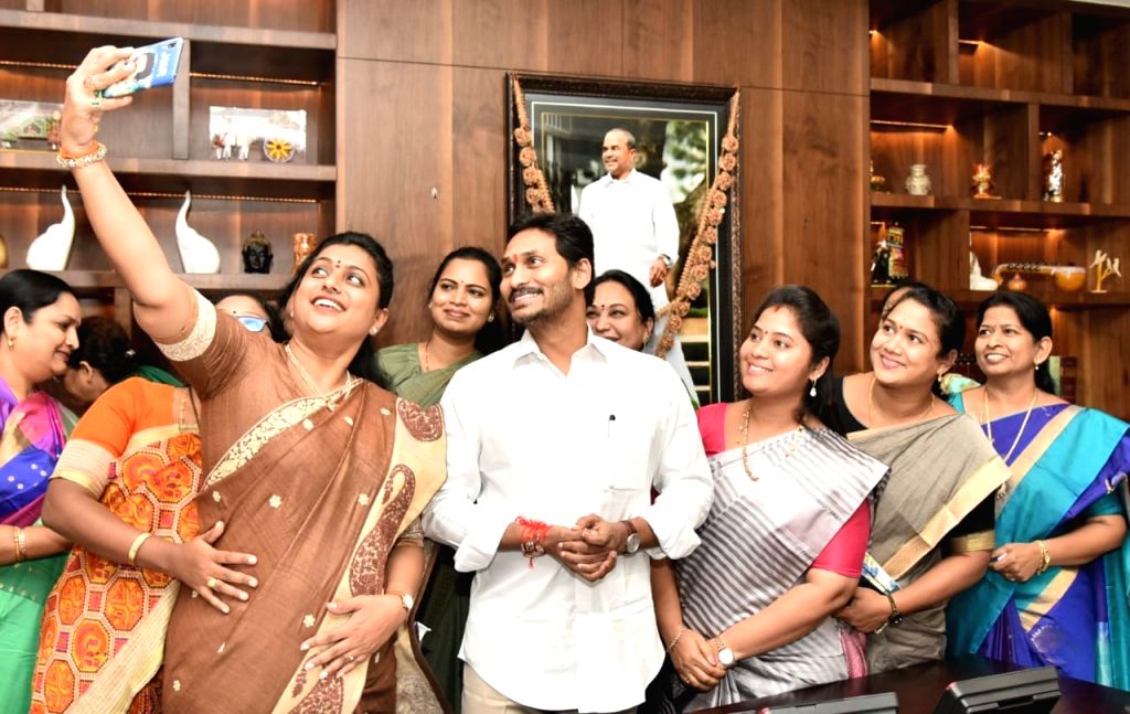 YSRCP MLAs celebrate the clearance of A.P. Disha Bill 2019 with Andhra CM
