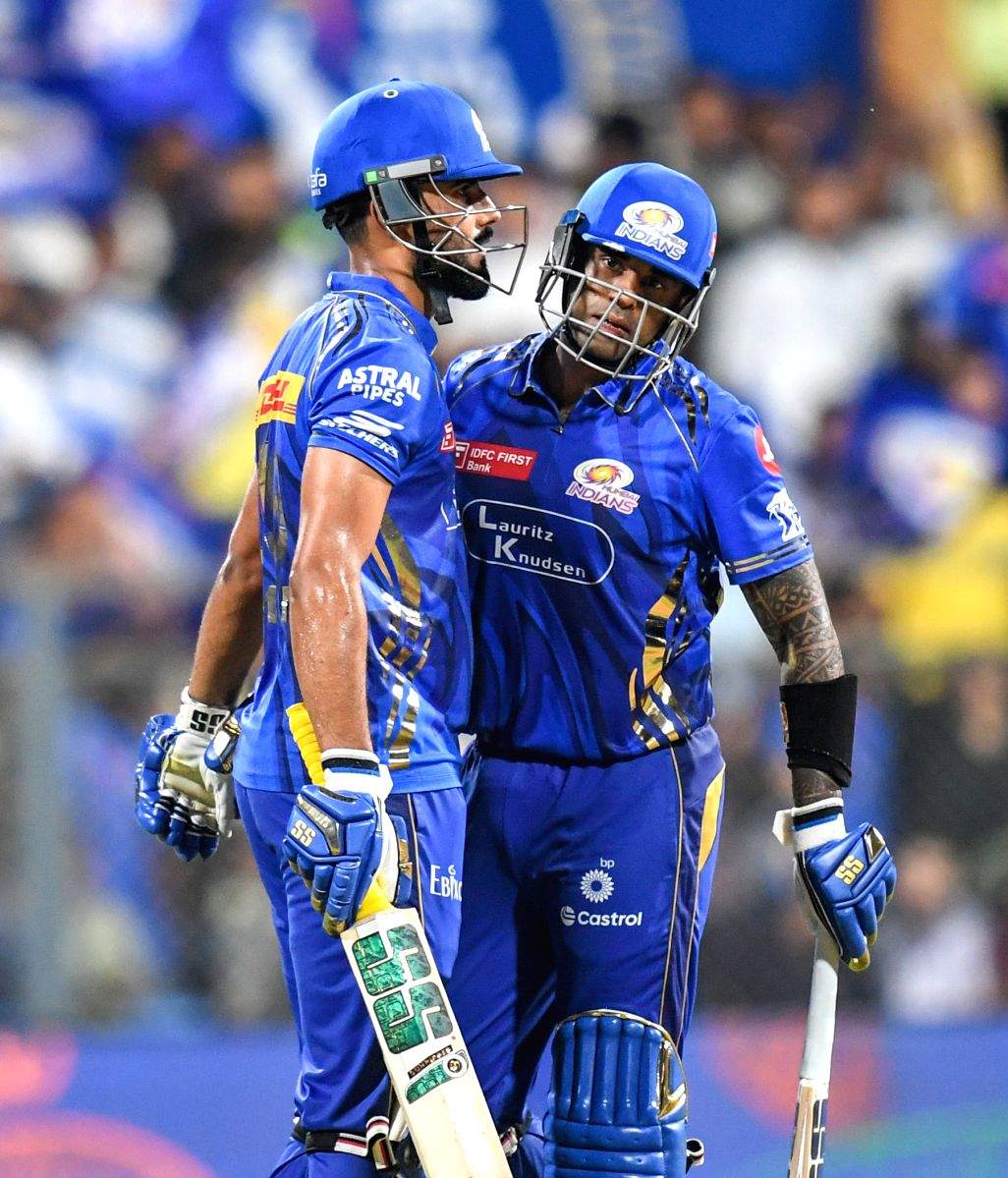 Mumbai Indians Clinch Playoff Spot with Big Win Over DC