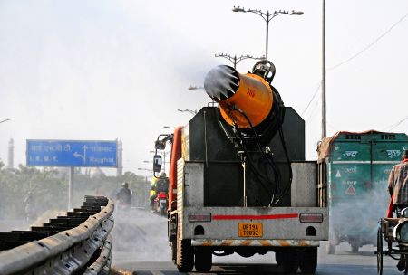An anti-smog gun sprinkle water to curb air pollution