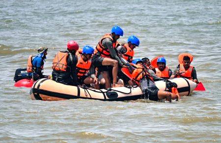 Fire Brigade Personnel Conduct Monsoon Rescue Drill