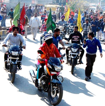 Magician Samrat Shankar rides a motor cycle blindfolded
