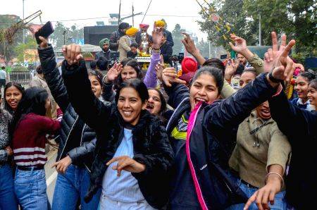 Staff and students celebrate as the Maulana Abdul Kalam Azad Trophy ...