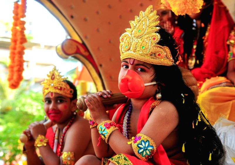: Mumbai: A child dressed as Lord Hanuman participate in a religious ...
