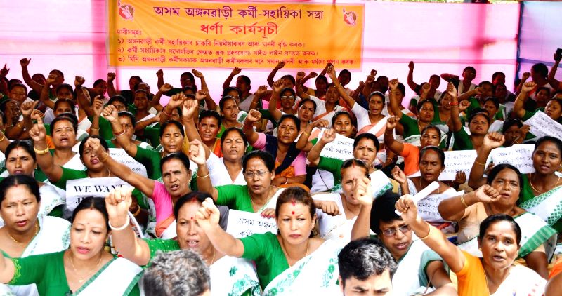 Assam Anganwadi Workers and Helpers Union members stage a protest