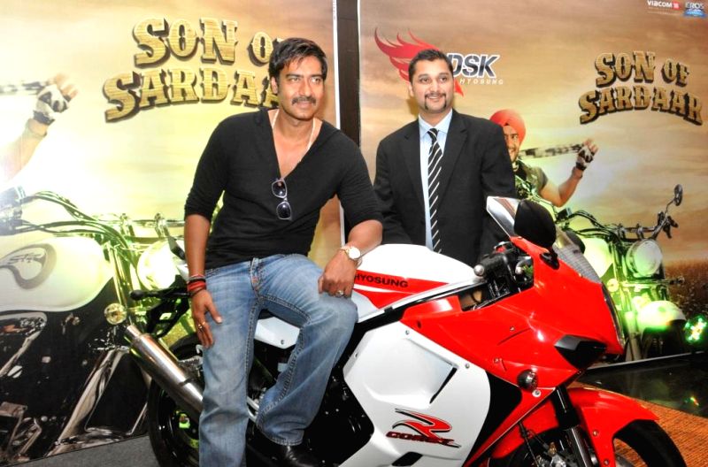 Ajay Devgan at announces the winner of "Picture Dekho Bike jeeto" contest
