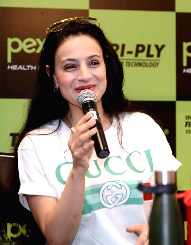Bollywood actress Ameesha Patel addresses during the launch