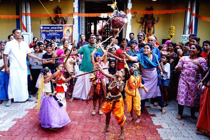 Children participate in 'Uriyadi' on Sri Krishna Jayanti