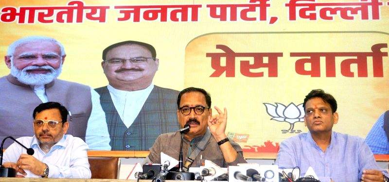 Delhi BJP President Virendra Sachdeva addresses a press Conference at ...