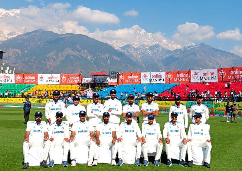 Dharamshala : Indian team poses for a photograph after they won the ...