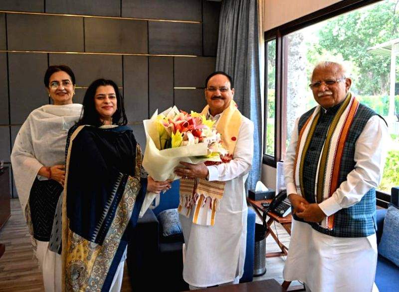 Former Haryana Congress leader Kiran Choudhry along with her daughter ...
