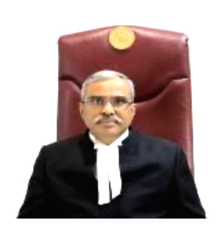 Free Photo: Justice Dinesh Kumar Sharma.