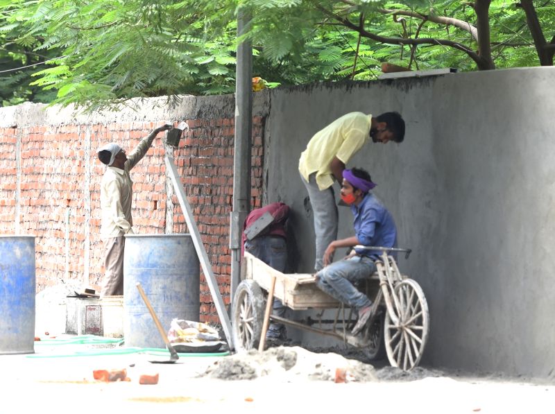 New Delhi:Labour working on a Construction site after construction and ...