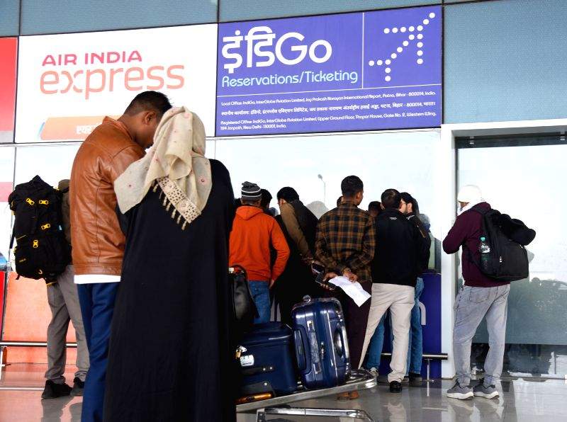 Passengers Gather at IndiGo Counter